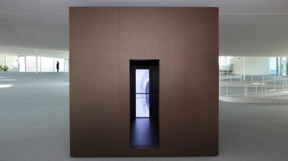 A cube materializes in the curves of the Rolex Learning Center - EPFL